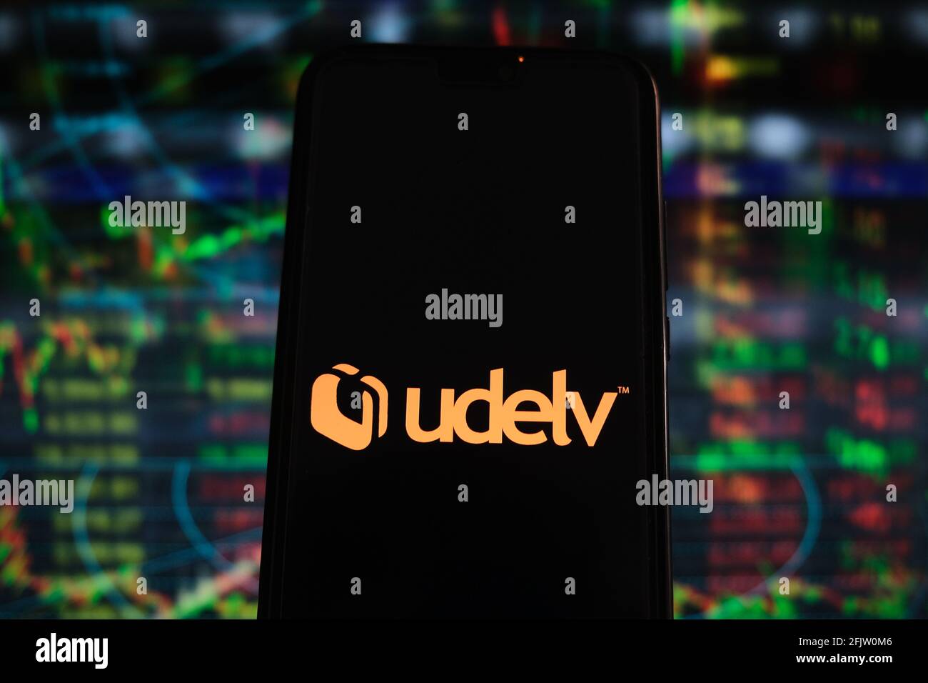 In this photo illustration an Udelv logo seen displayed on a smartphone ...