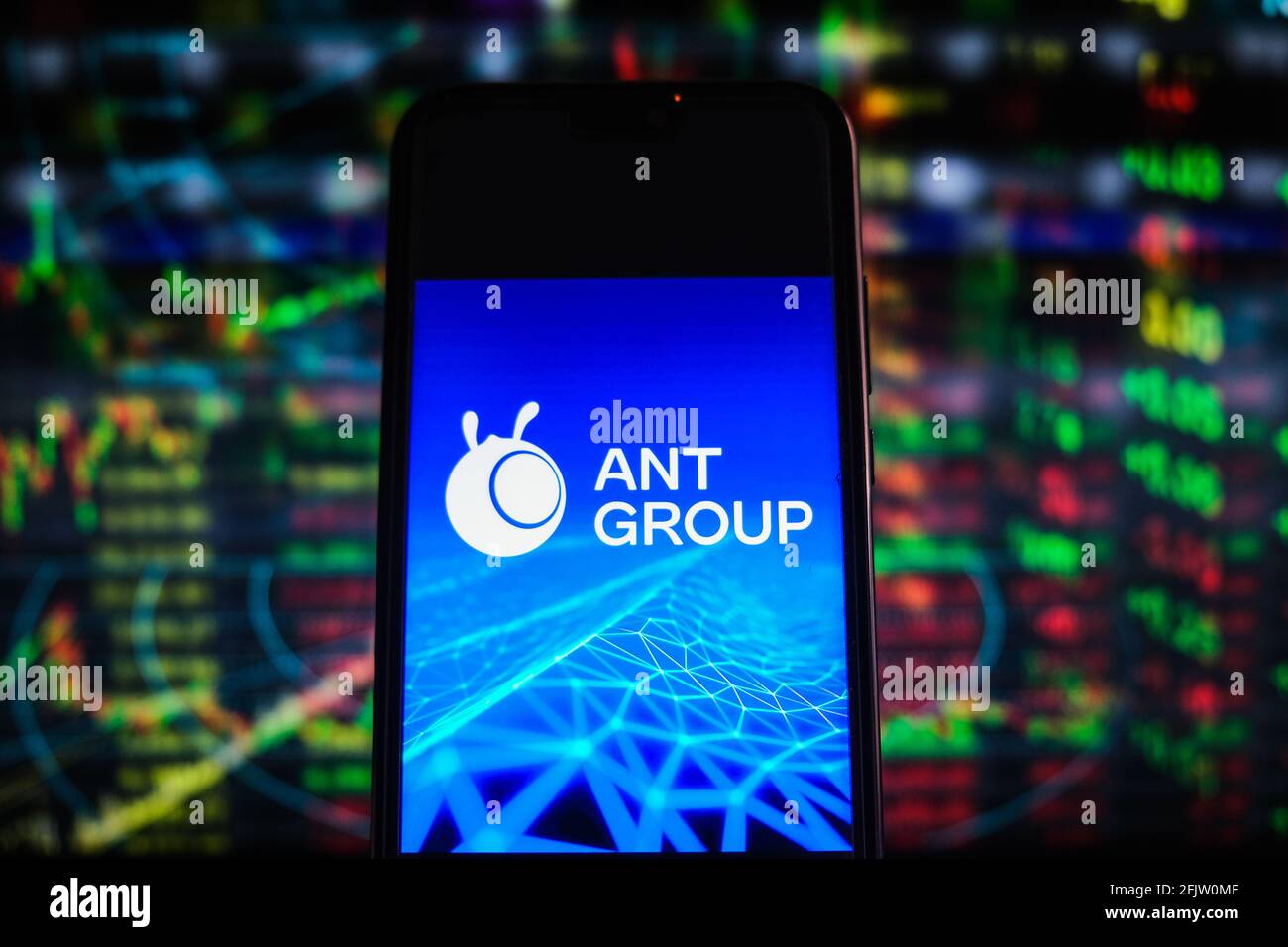 In this photo illustration an Ant Group logo seen displayed on a ...