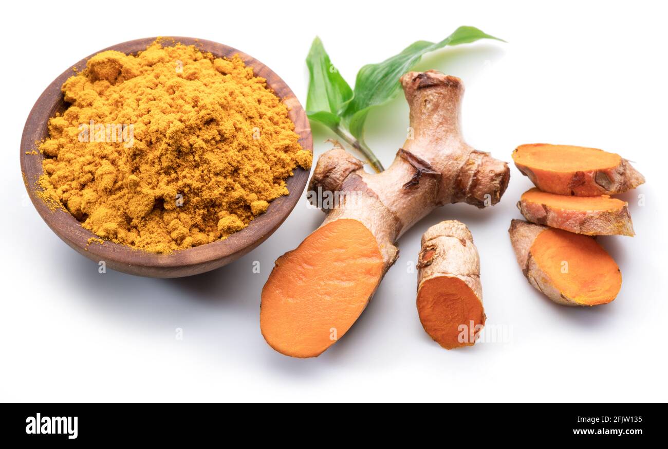 Fresh turmeric rhizome and turmeric powder isolated on white background ...