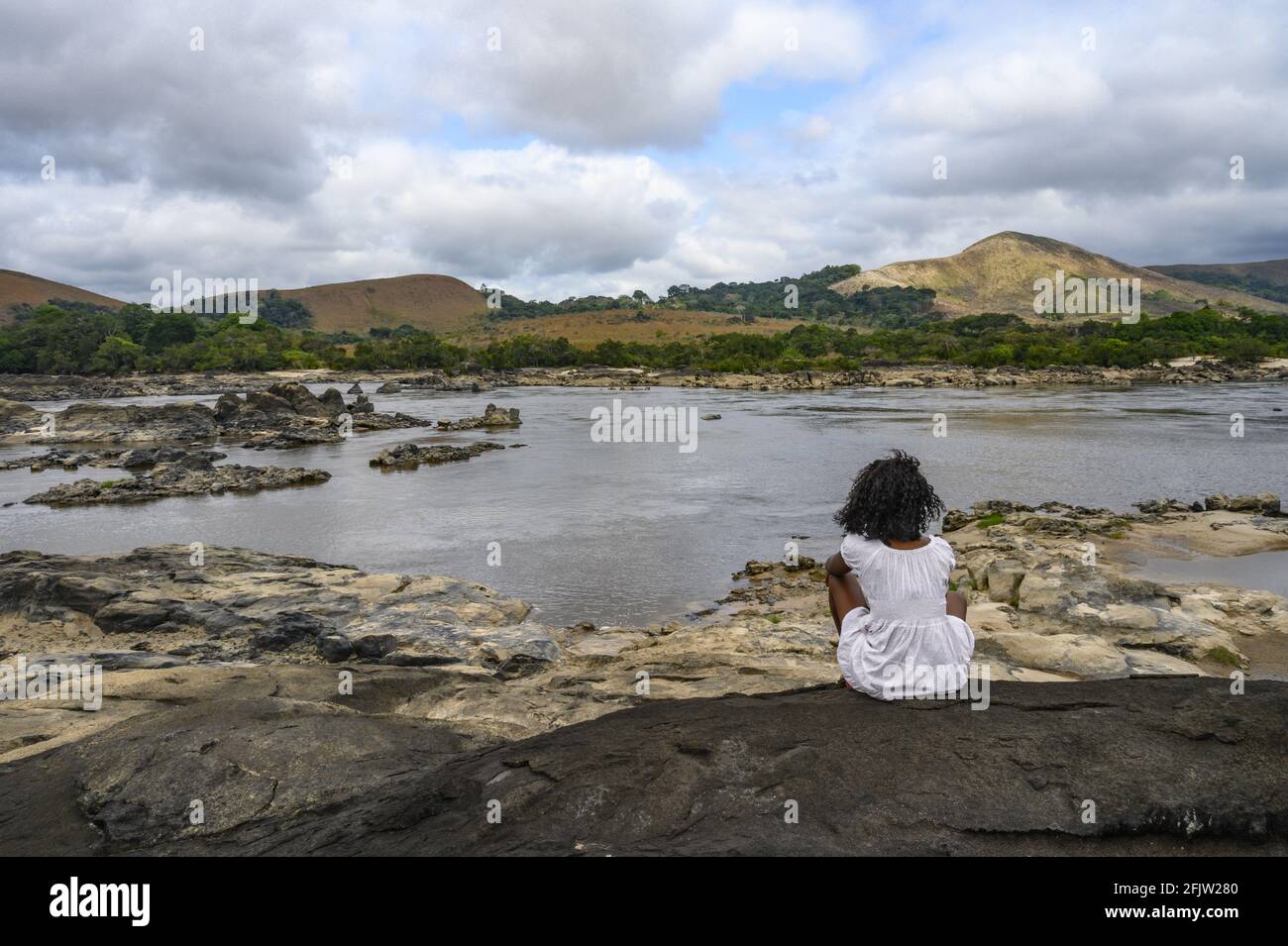 Gabon, Ogooué-Ivindo district, La Lopé, woman watching Ogooué river ...
