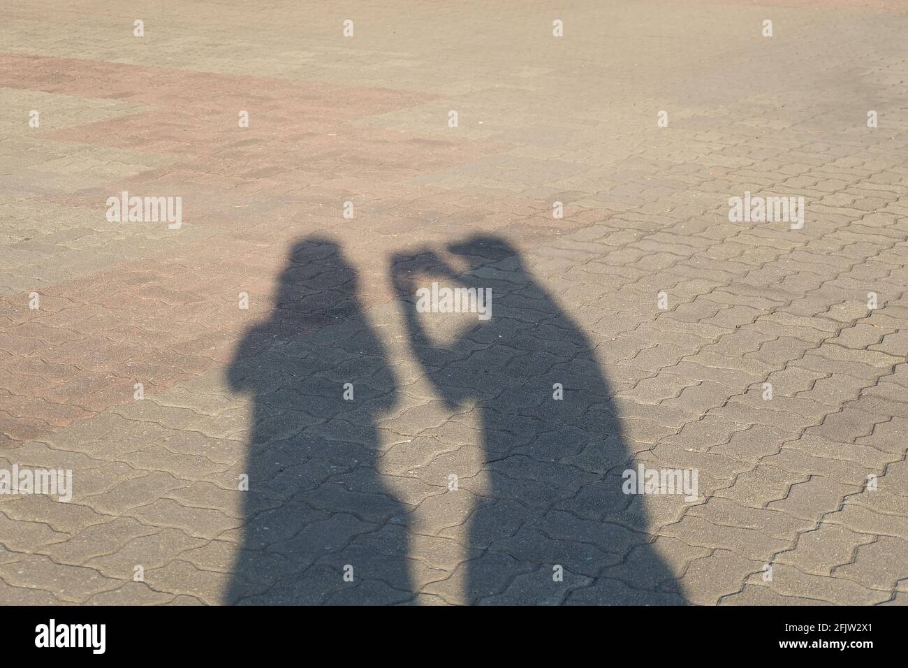 Two People Playing Shadow