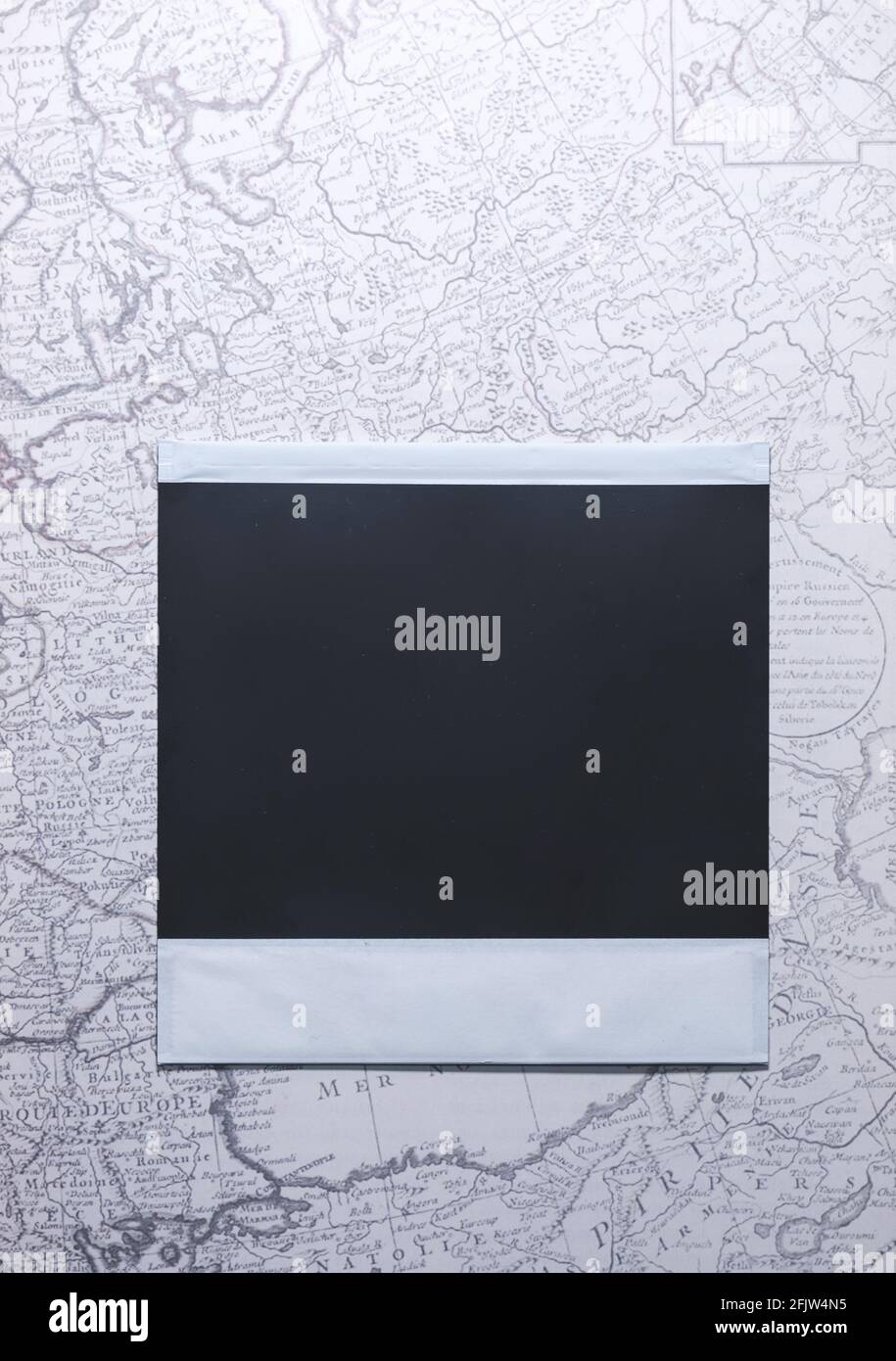 Top View of photo frame on map, Memory of a trip or adventure. Photo ...