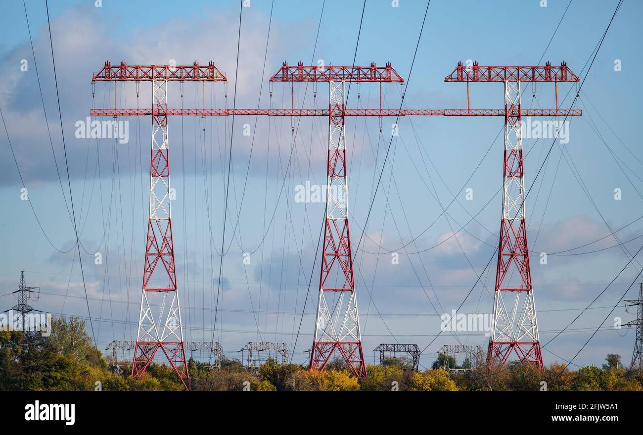 high voltage post. Tree High voltage towers. Group of transmission ...