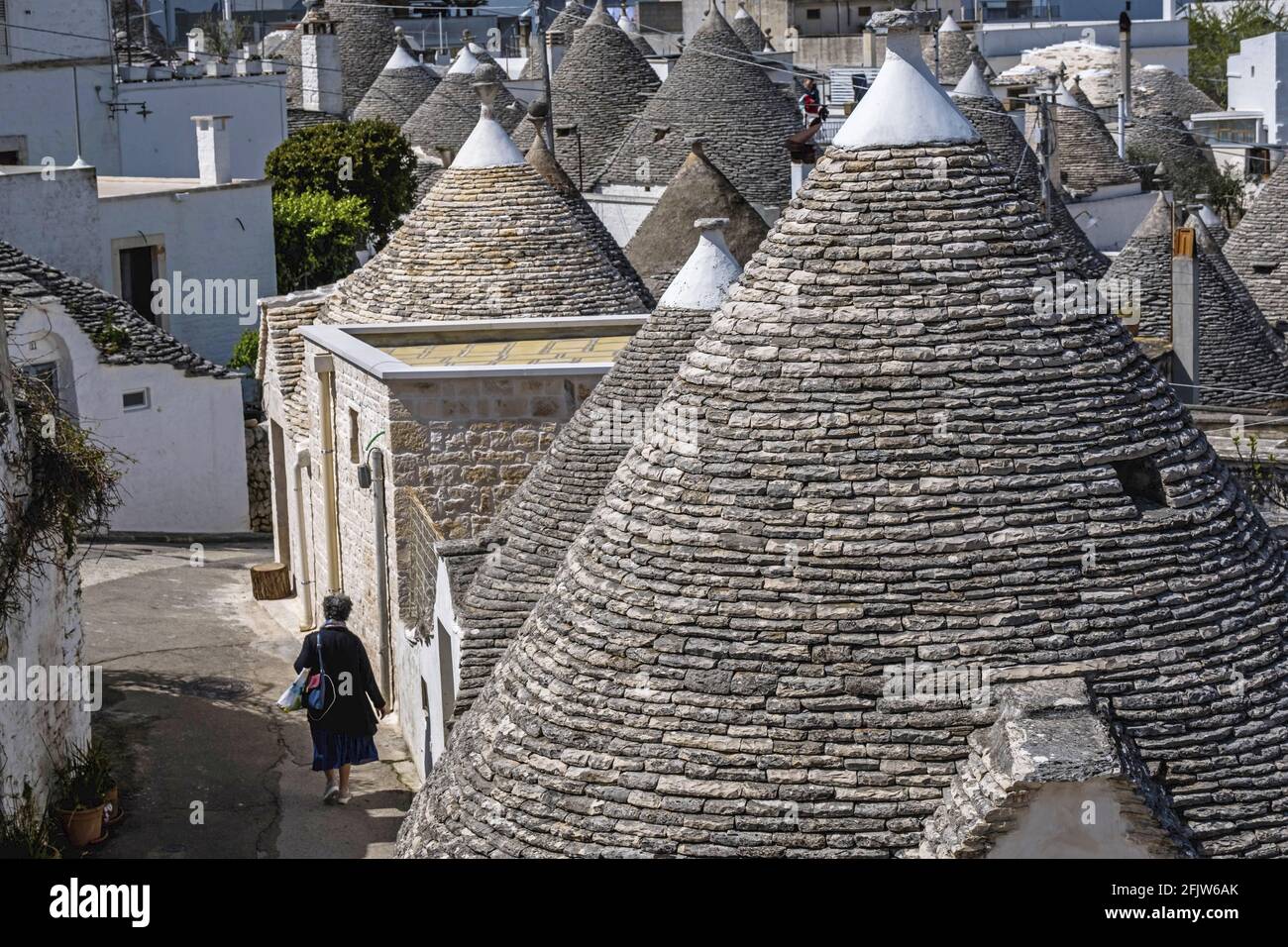 Italia, Puglia, Alberobello, bee-hives houses, or trulli Stock Photo ...