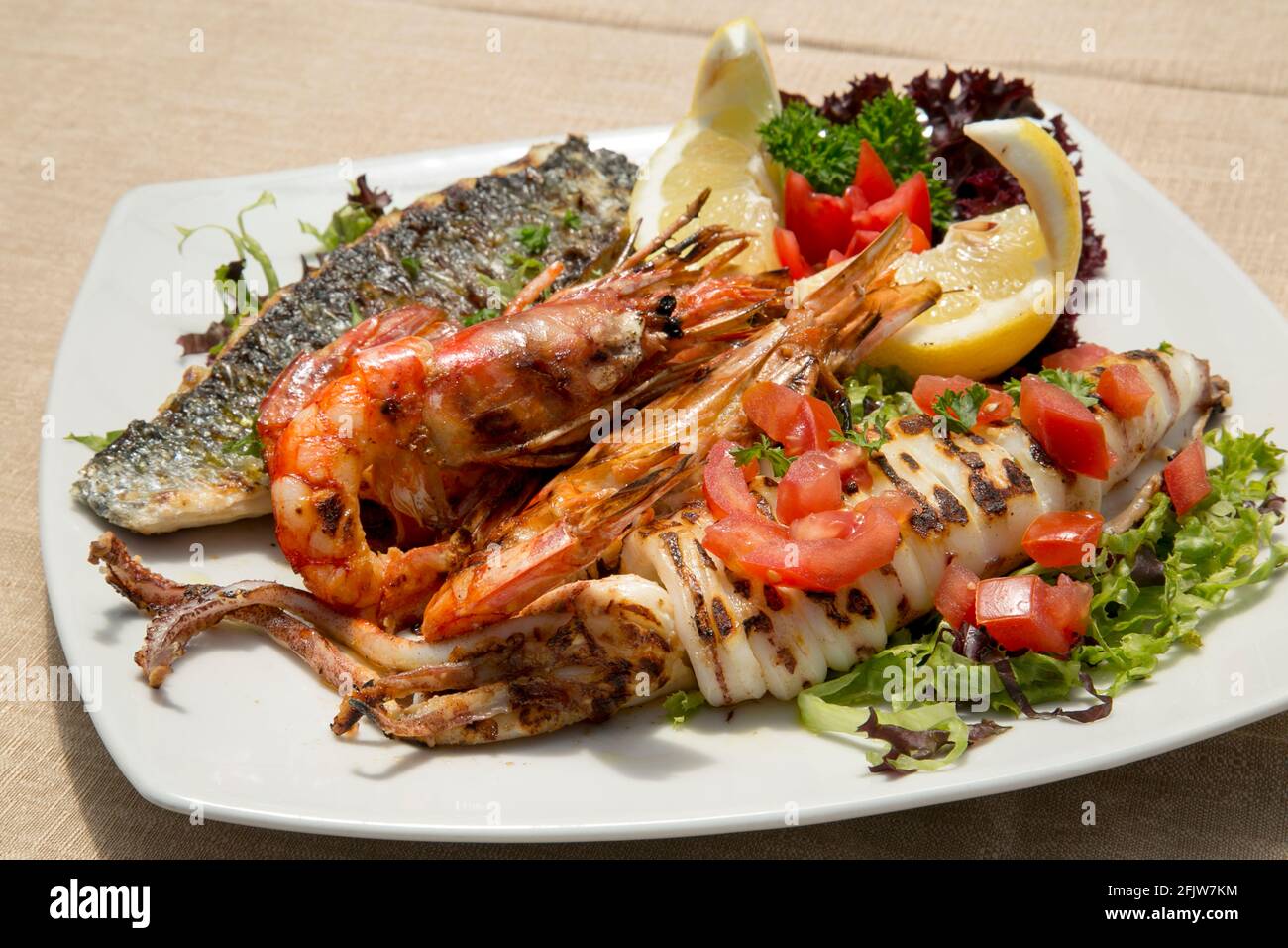 fish dishes of Italian cuisine Stock Photo - Alamy