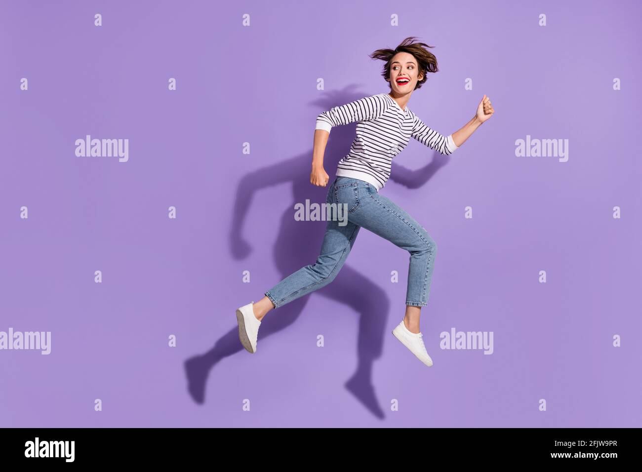 Full length photo of shiny charming lady dressed casual clothes jumping ...