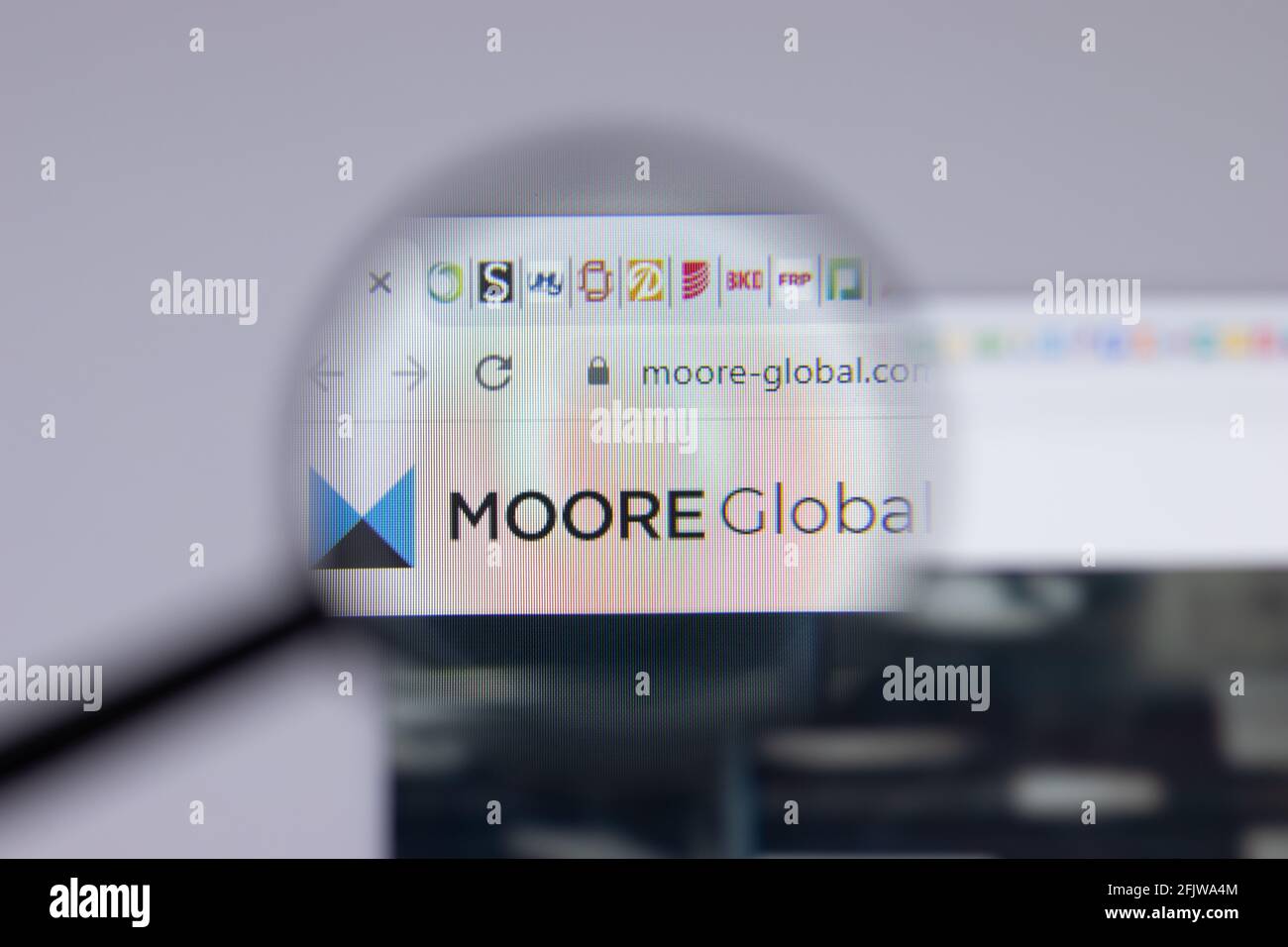 New York, USA - 26 April 2021: Moore Global logo close-up on website ...