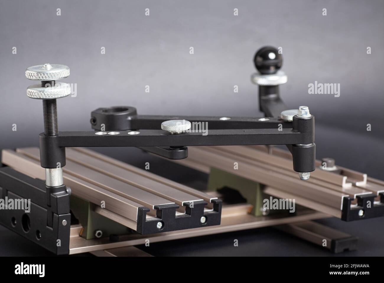 Engraving device pantograph on black background Stock Photo - Alamy