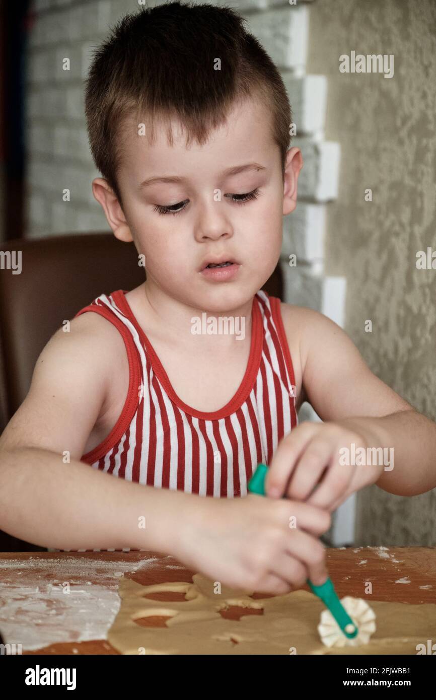 Boy cutting his hand with cutter hi-res stock photography and images ...