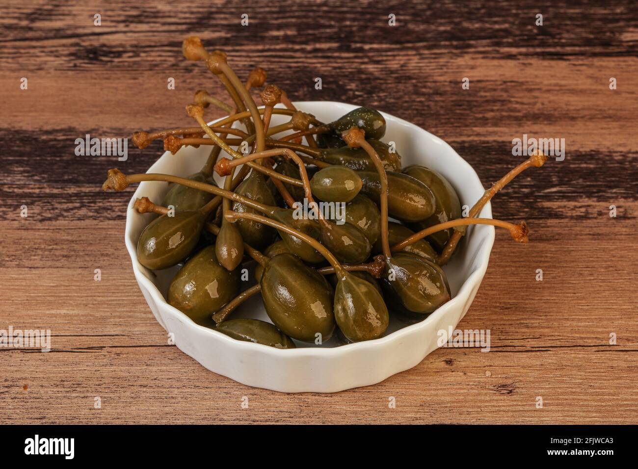 Tasty Caper berries in the bowl Stock Photo - Alamy