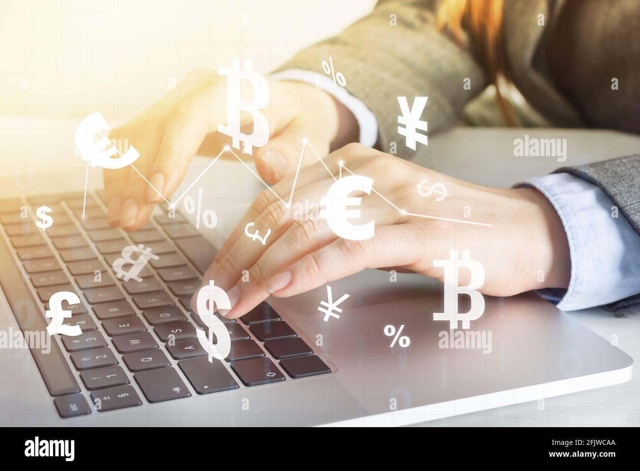 Hands of businesswoman using computer to buy or sell cryptocurrency and ...
