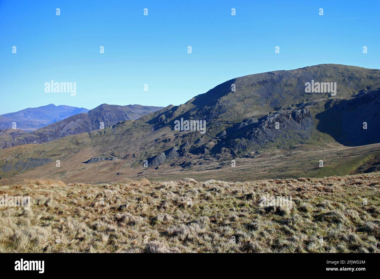 Views of walkers on Moelwyn Mawr from trail up Moelwyn Bach, Croesor ...