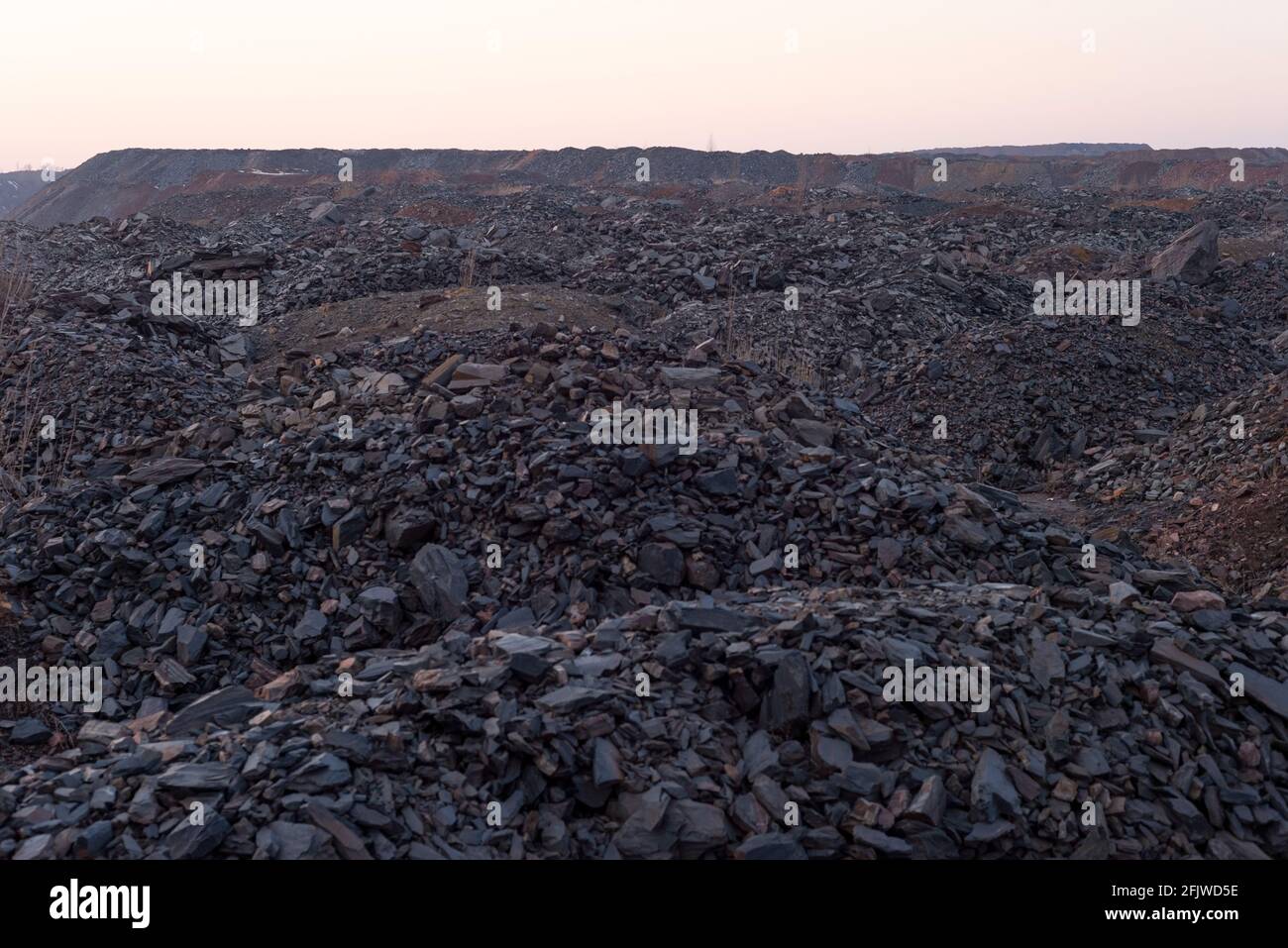granite quarry, dump, rocks, sunset background Big pile of gravel in a ...