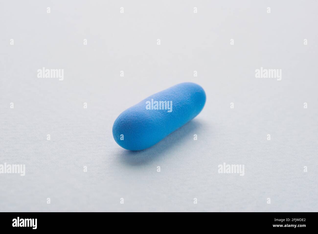 macrophotography of a model of bacteria, bacillus. On a blue background ...
