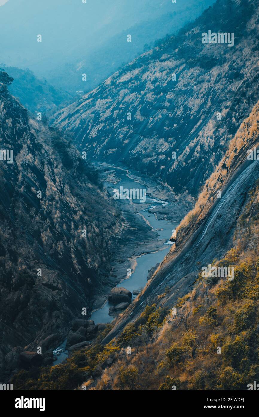 Breathtaking landscape of a river flowing in the valley between high ...