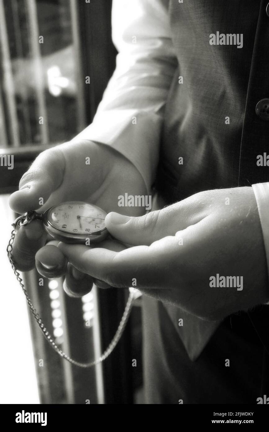 Vintage pocket watch person hi-res stock photography and images - Alamy