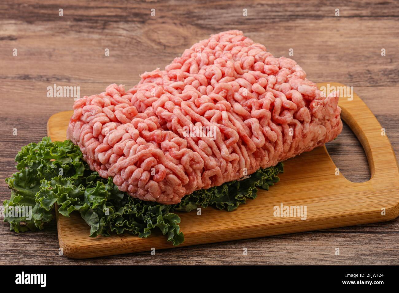 Raw pork minced meat with spices for cooking Stock Photo - Alamy