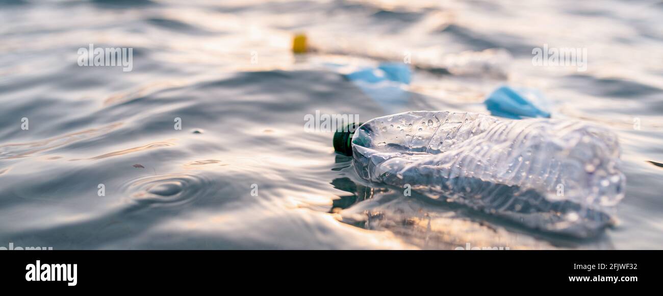 Horizontal banner or header Garbage floating on sea or ocean water with ...