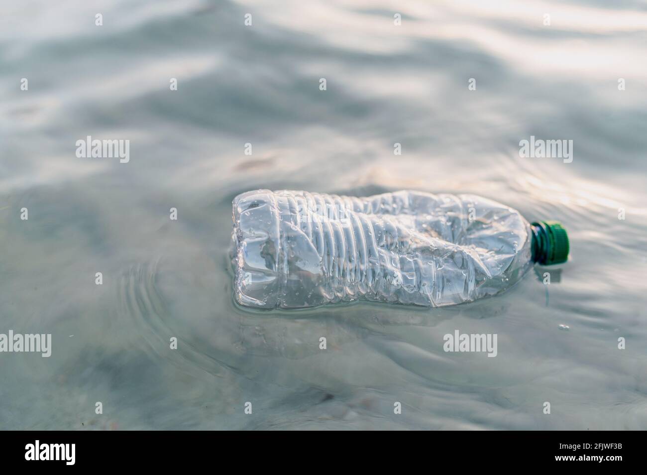 Top view Garbage floating on sea or ocean water with plastic bottles ...