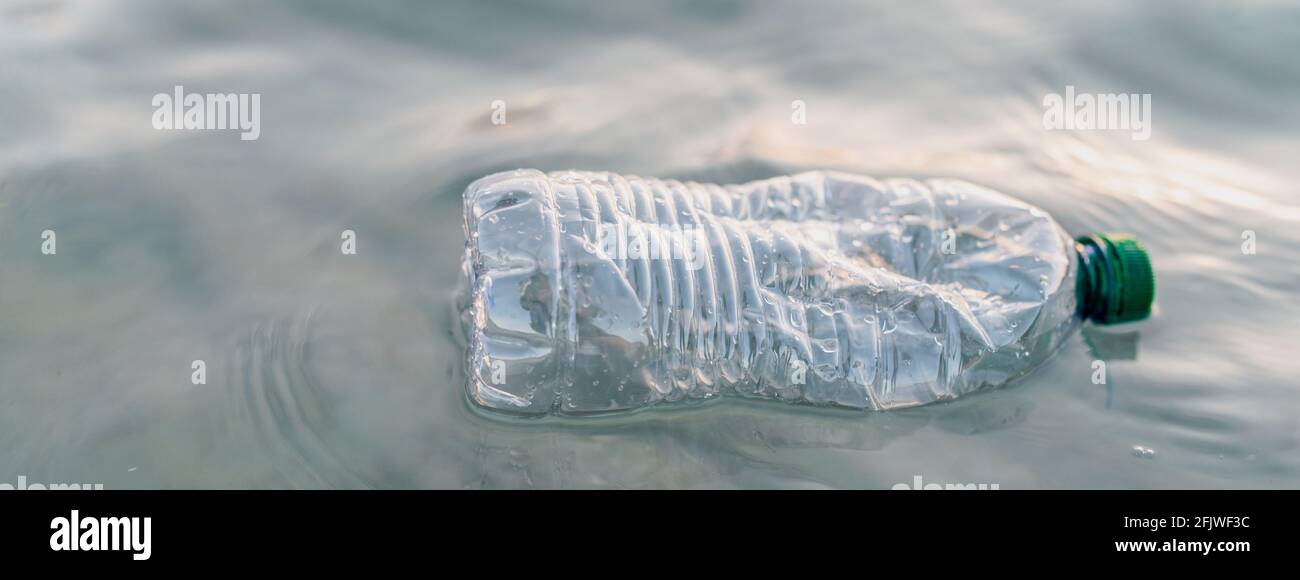 Horizontal banner or header Garbage floating on sea or ocean water with ...