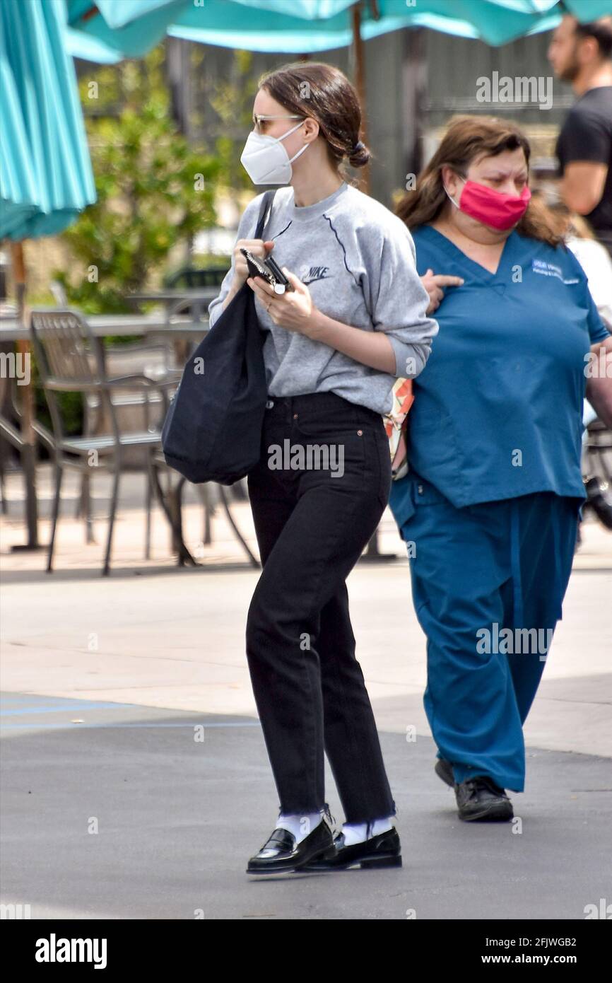 Los Angeles - CA - 20210313 - Rooney Mara covers up with a protective ...