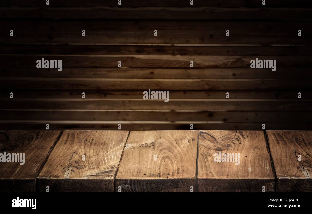 Old wooden tabletop and wooden wall at the background Stock Photo - Alamy
