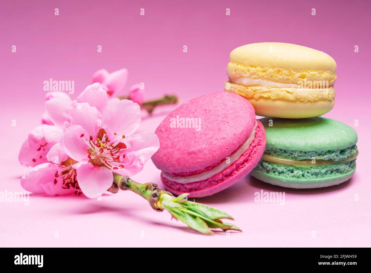 Colorful sweet macarons or macaroons, different flavored cookies on ...