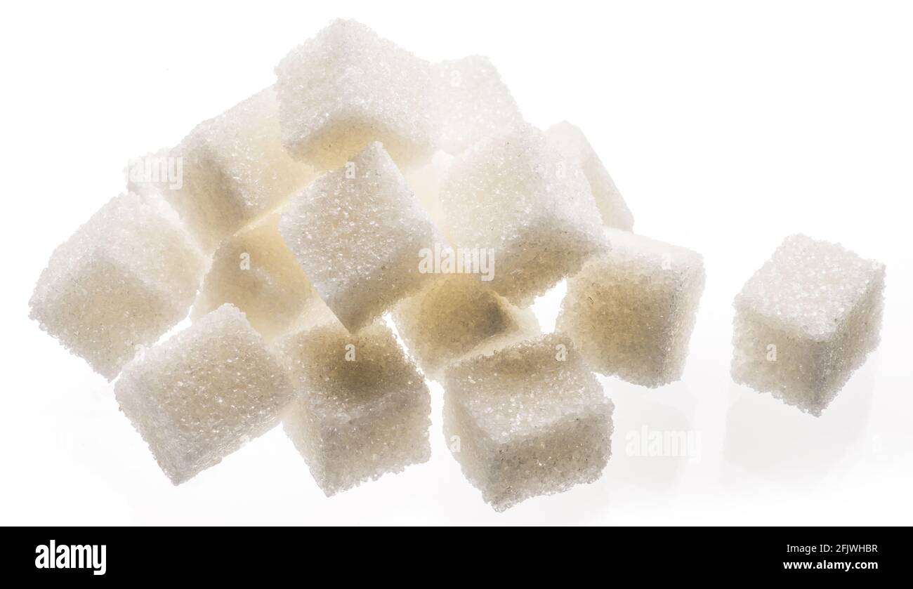 White sugar cubes on white background. Macro picture Stock Photo - Alamy