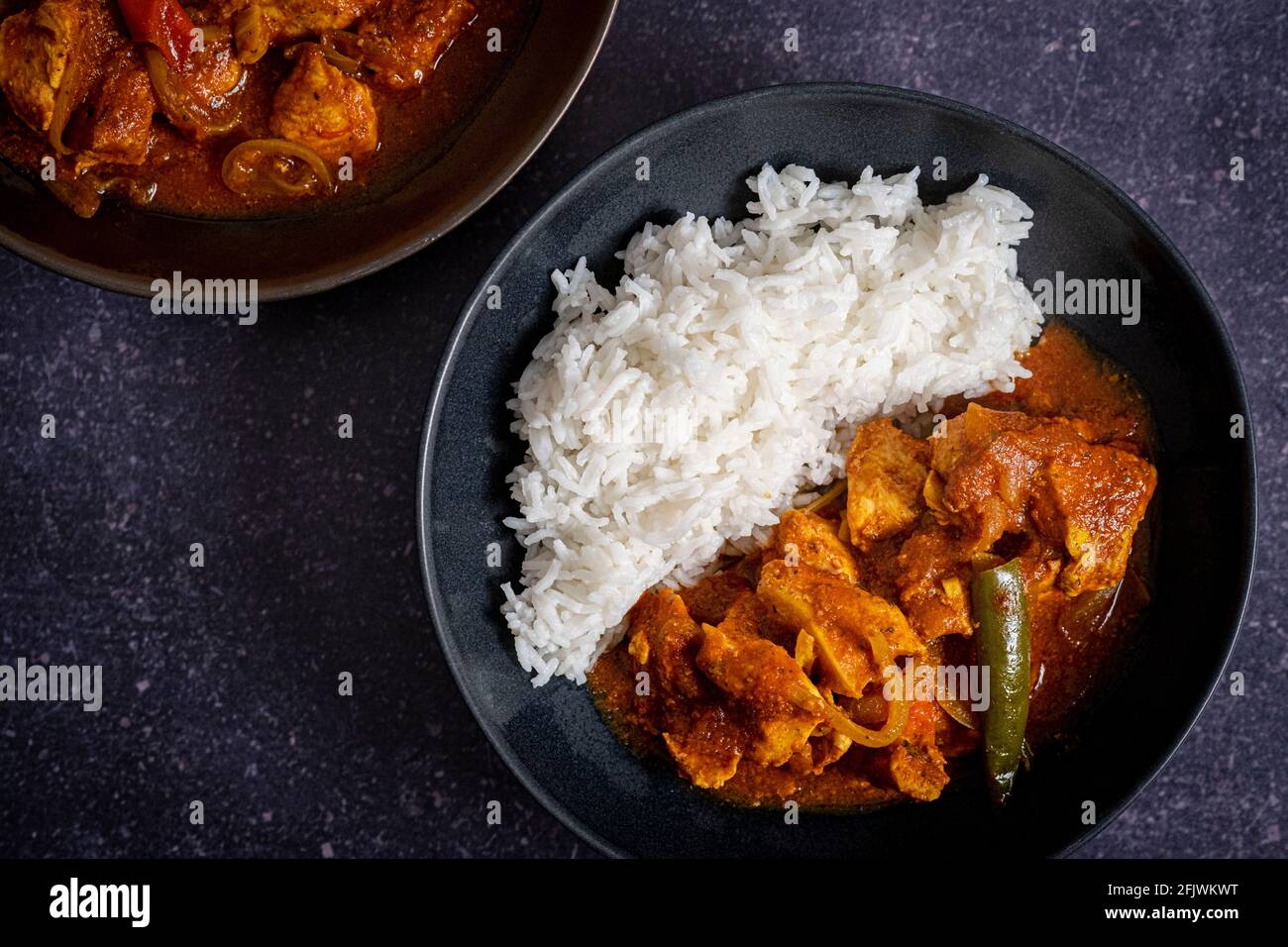 Chicken madras with basmati rice Stock Photo - Alamy