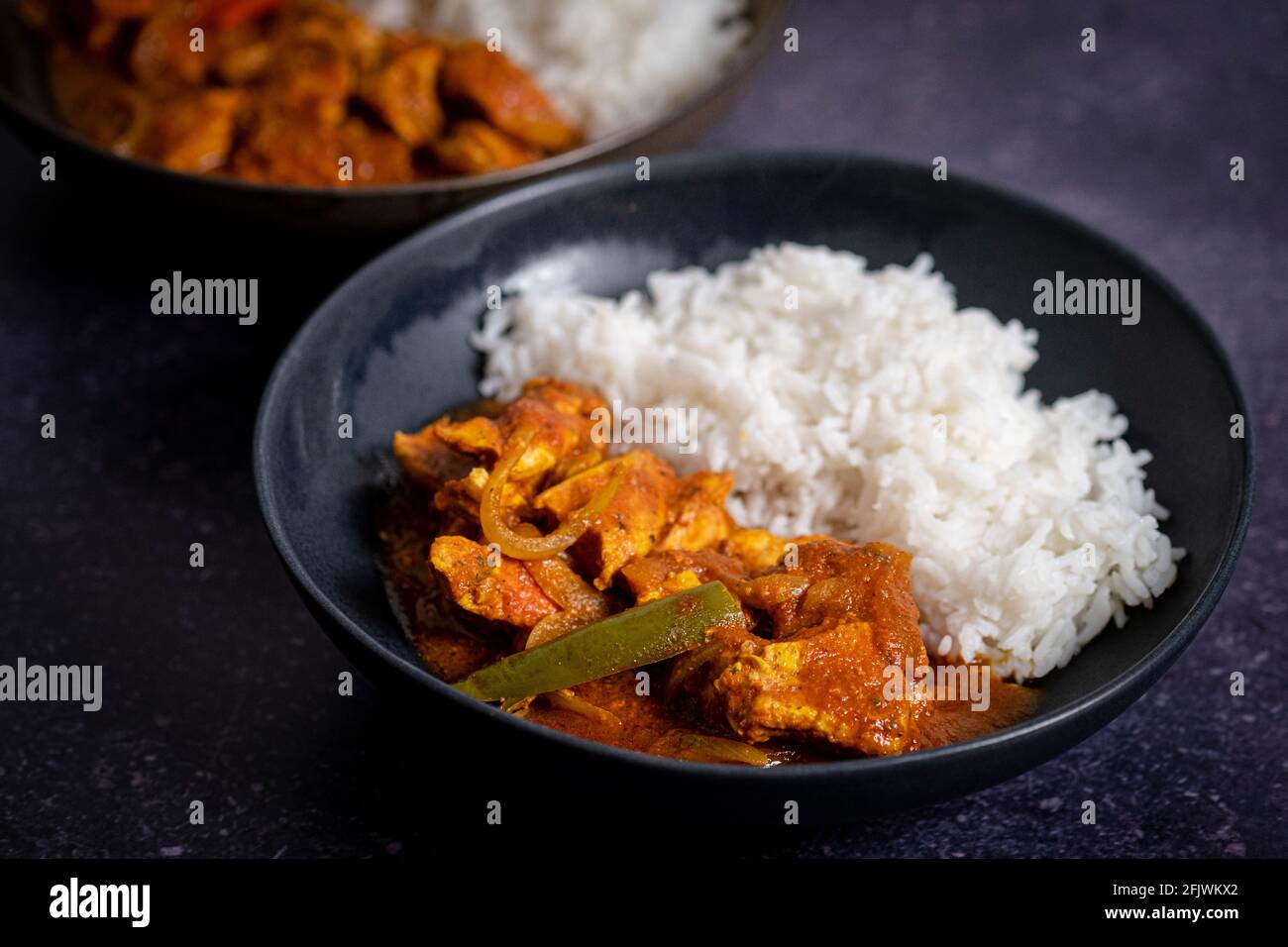 Chicken madras with basmati rice Stock Photo - Alamy