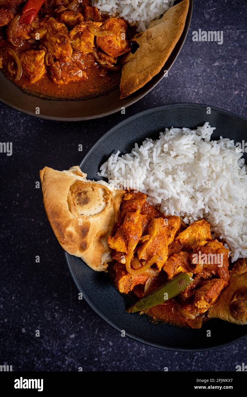 Chicken madras with basmati rice Stock Photo - Alamy