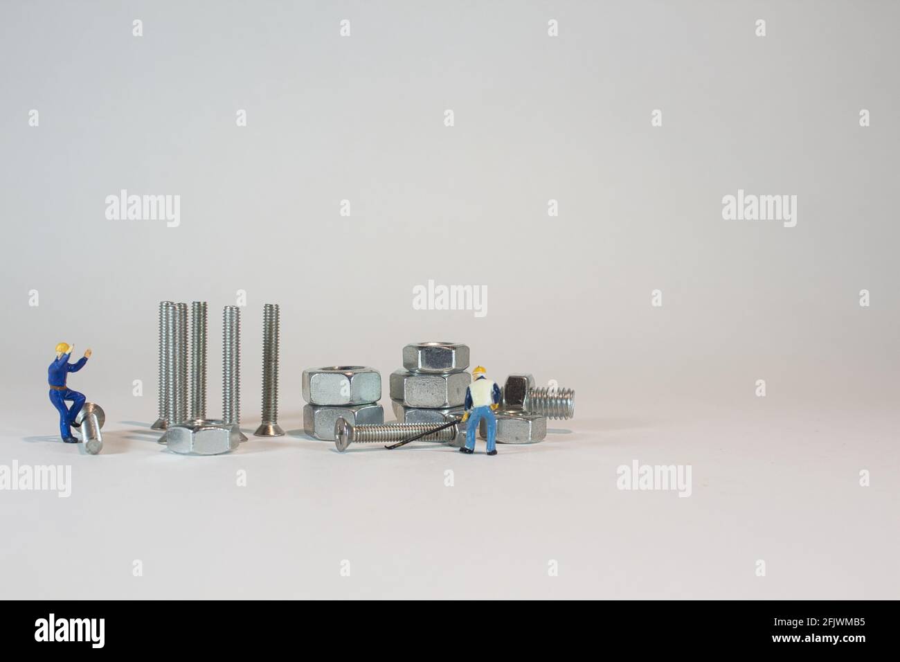 Toy figures construction workers working hi-res stock photography and ...