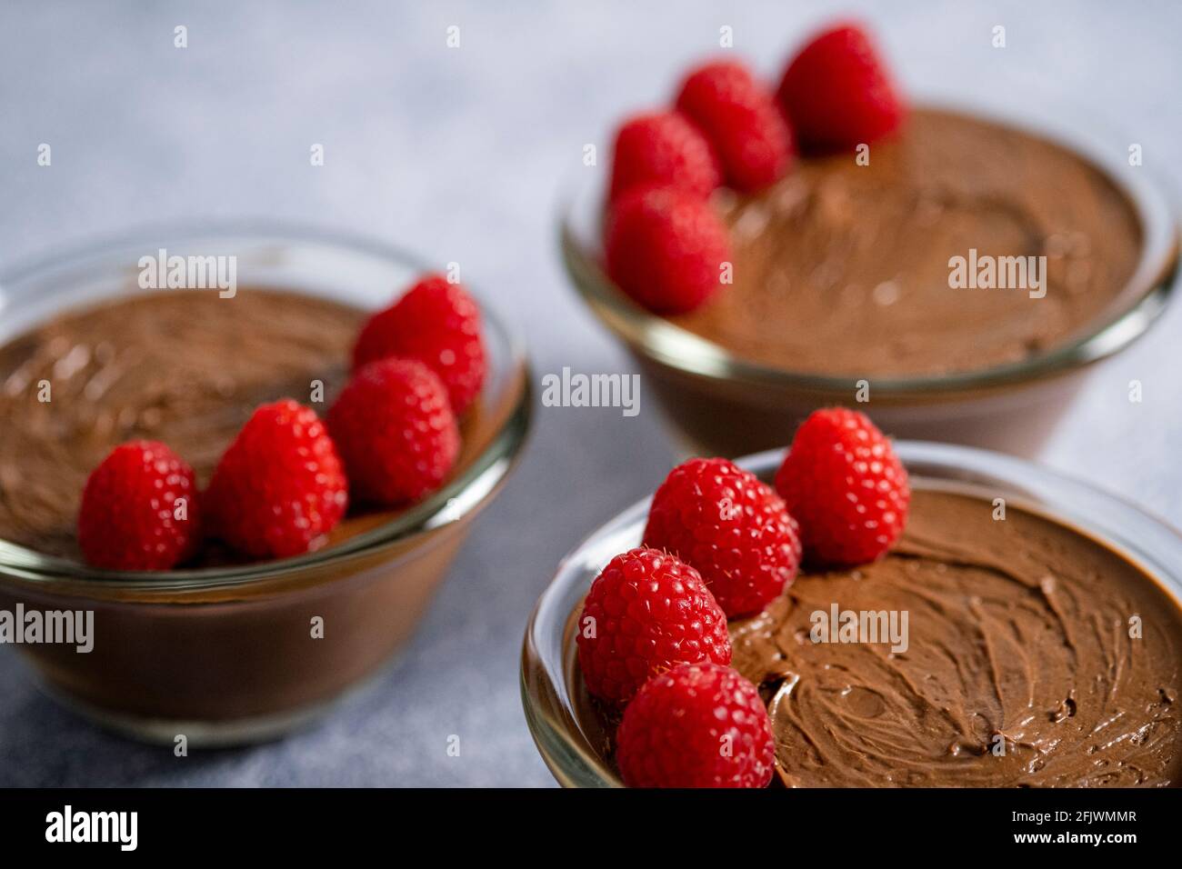 Chocolate mousse with raspberries Stock Photo - Alamy