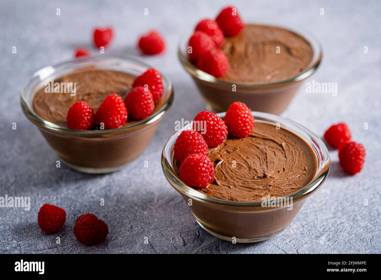 Chocolate mousse with raspberries Stock Photo - Alamy