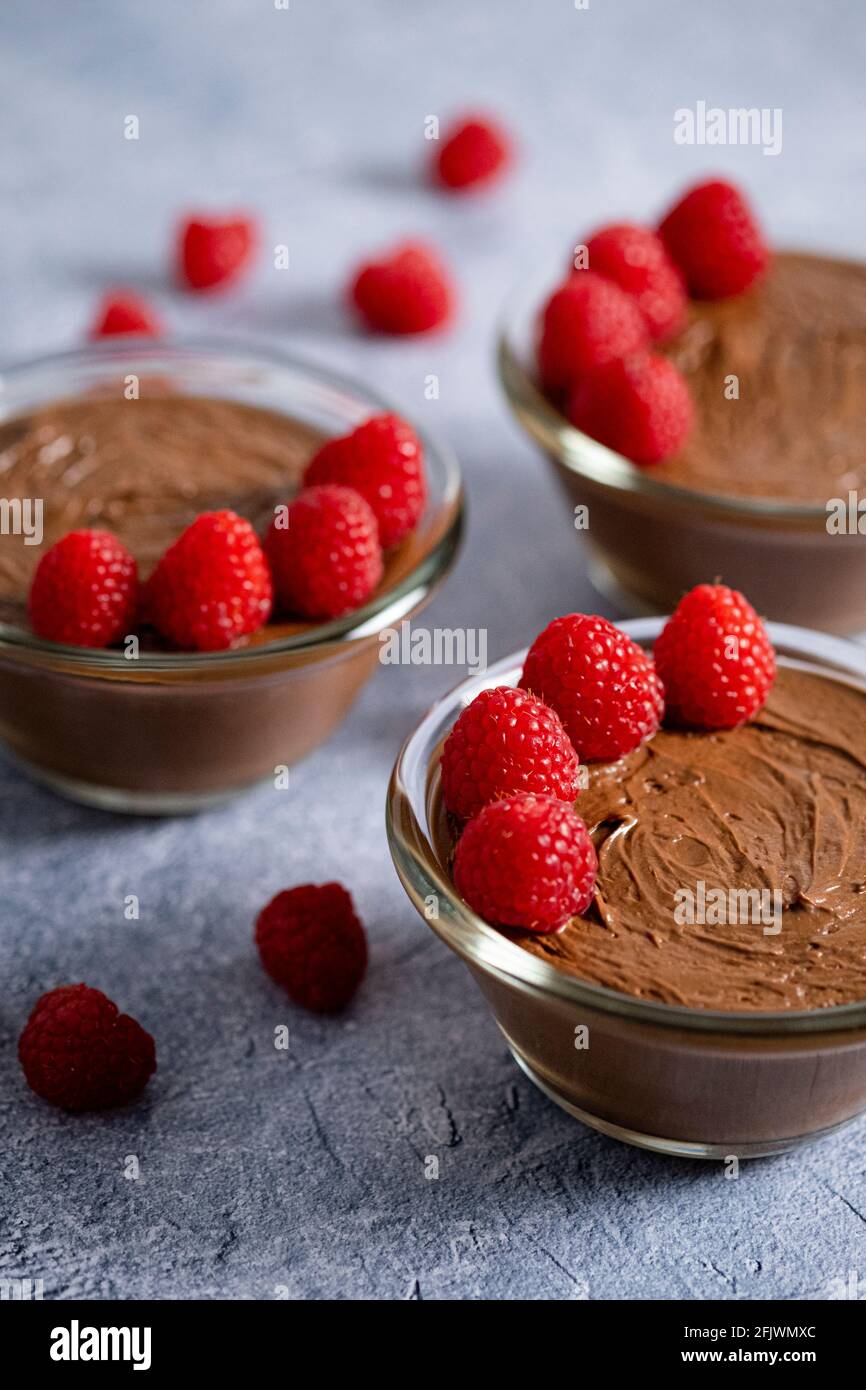 Chocolate mousse with raspberries Stock Photo - Alamy