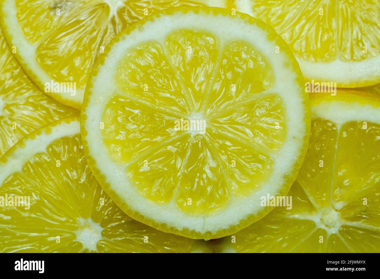 lemons cut into slices photographed close-up Stock Photo - Alamy