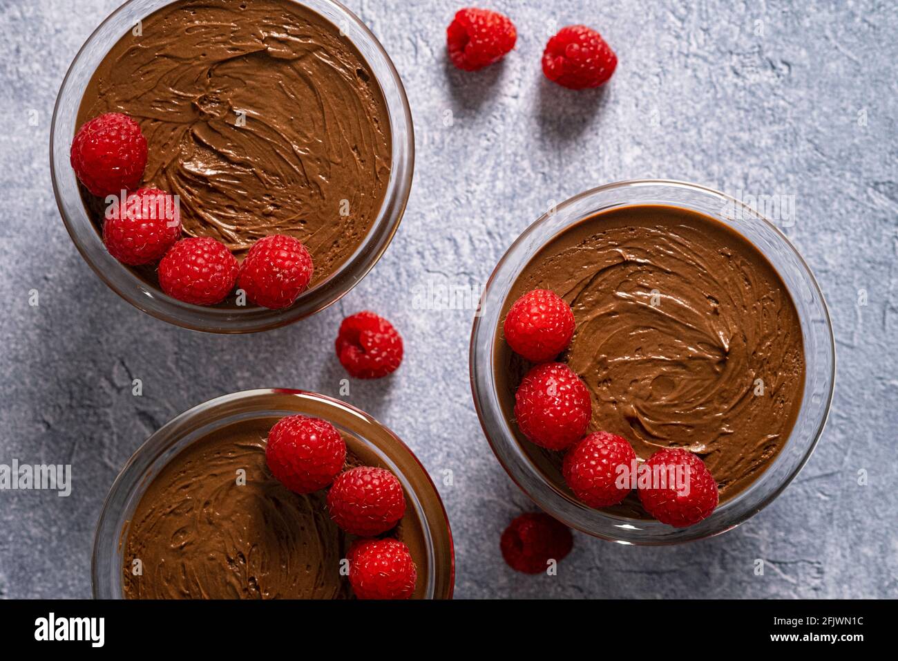 Chocolate mousse with raspberries Stock Photo - Alamy