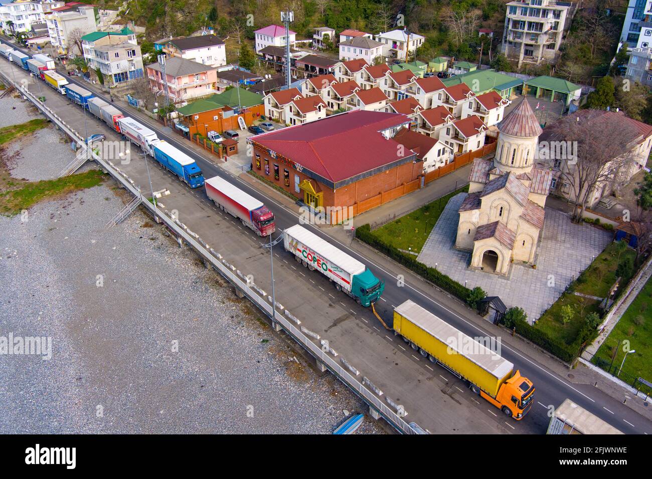 A queue of trucks on the Georgia-Turkey border in the village of Sarpi ...