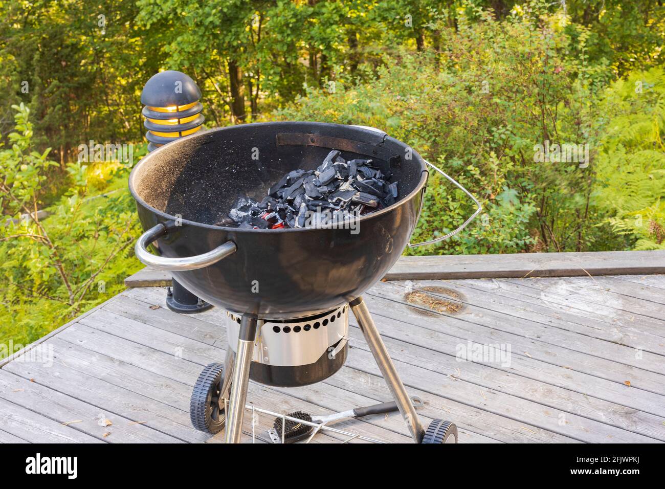 Close up view of embers in grill on patio. Sweden Stock Photo - Alamy