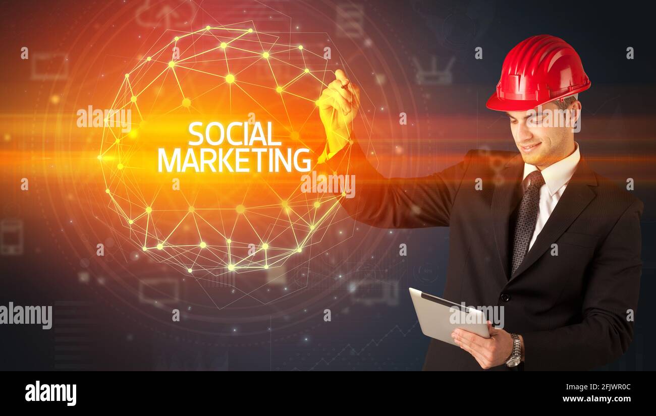 Handsome businessman with helmet drawing Stock Photo - Alamy