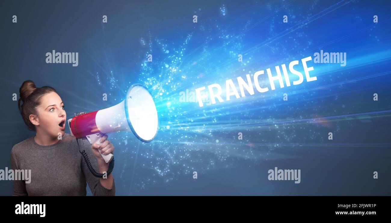 Young person shouting in loudspeaker Stock Photo - Alamy