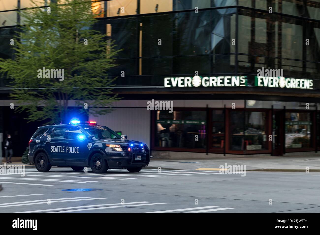 Seattle, USA. 5th Apr, 2021. A police car passing the Amazon campus in ...