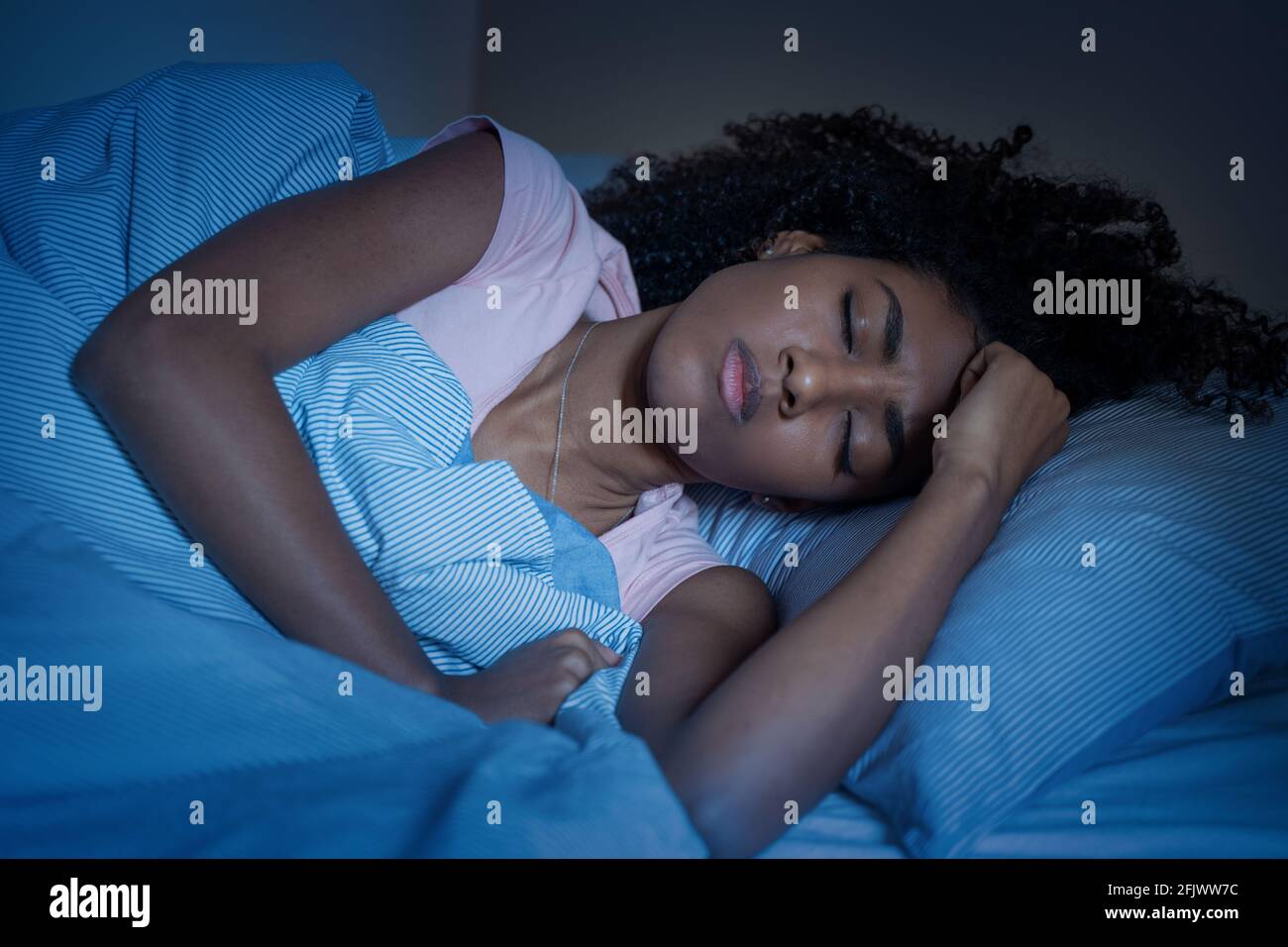 One black woman suffering insomnia sleeping disorder Stock Photo - Alamy