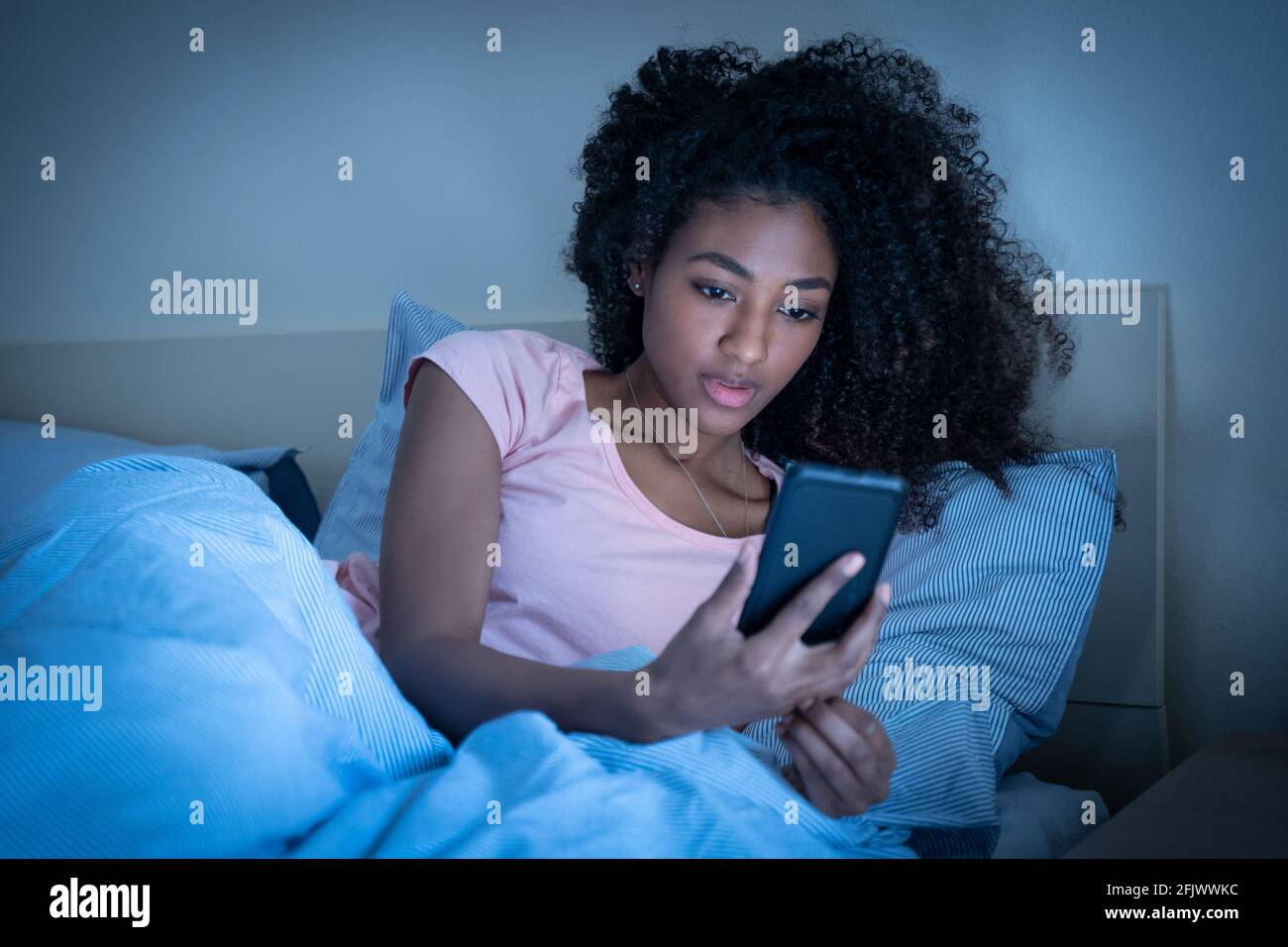 Phone night bed hi-res stock photography and images - Alamy