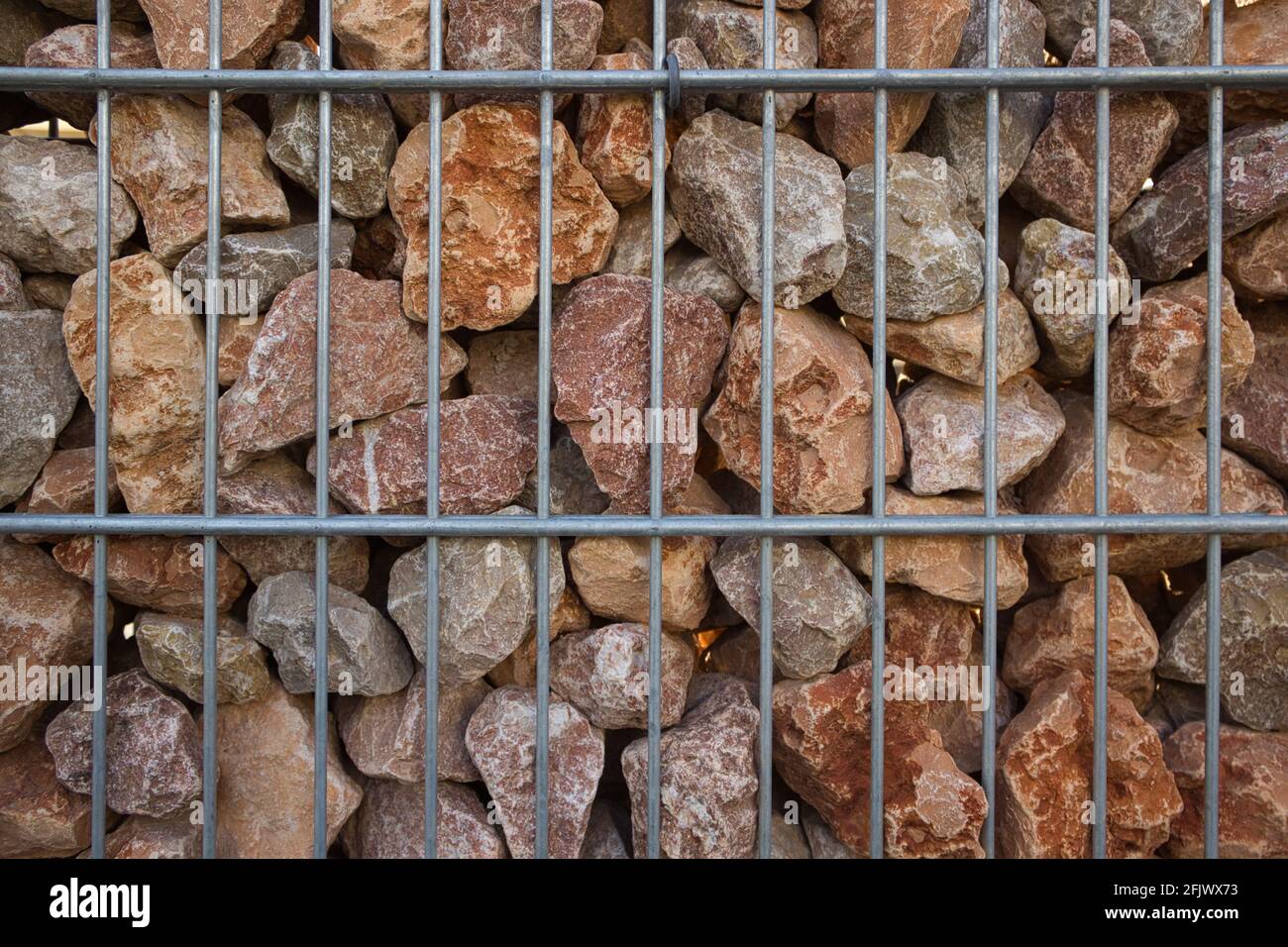 Stones behind bars rock hi-res stock photography and images - Alamy