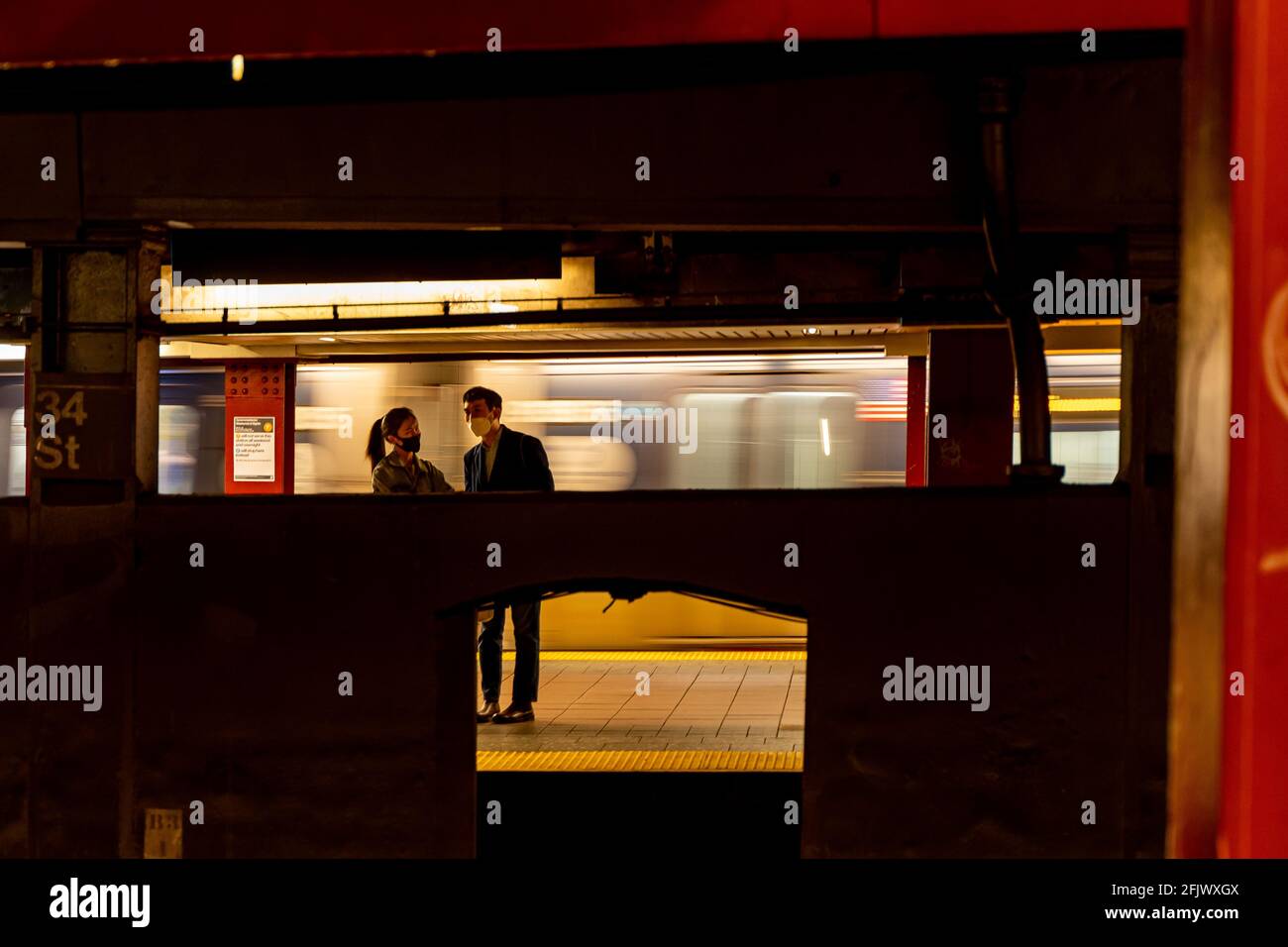 Couple in the NYC Subway Stock Photo - Alamy