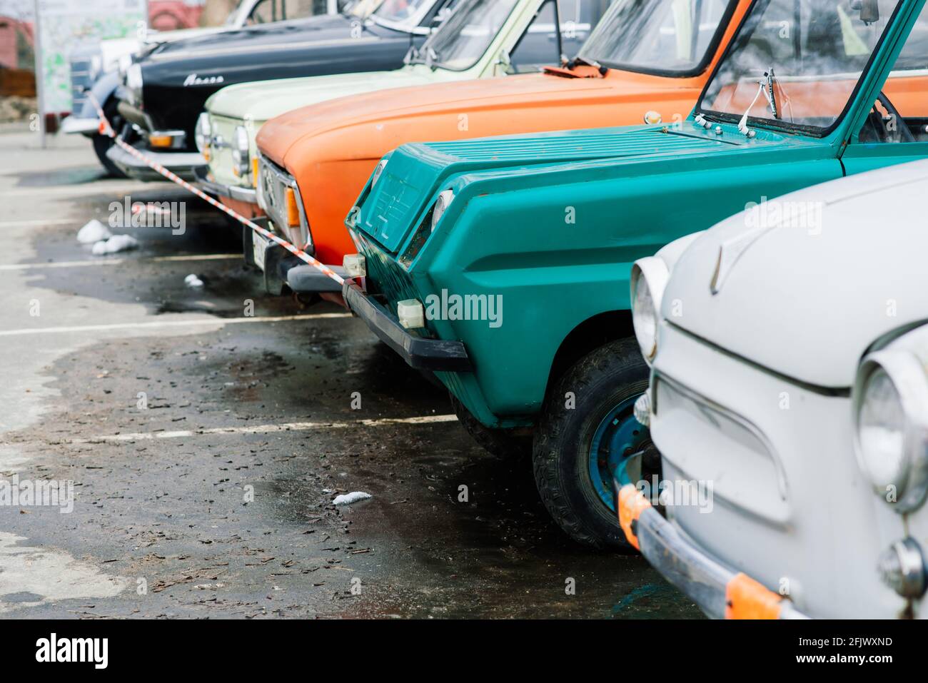 Old Soviet retro vintage car in open air. Row of auto of the Soviet era ...