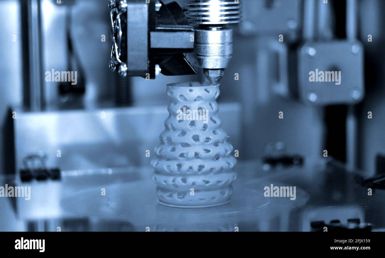 3d printer printing objects blue gray color form closeup Stock Photo ...