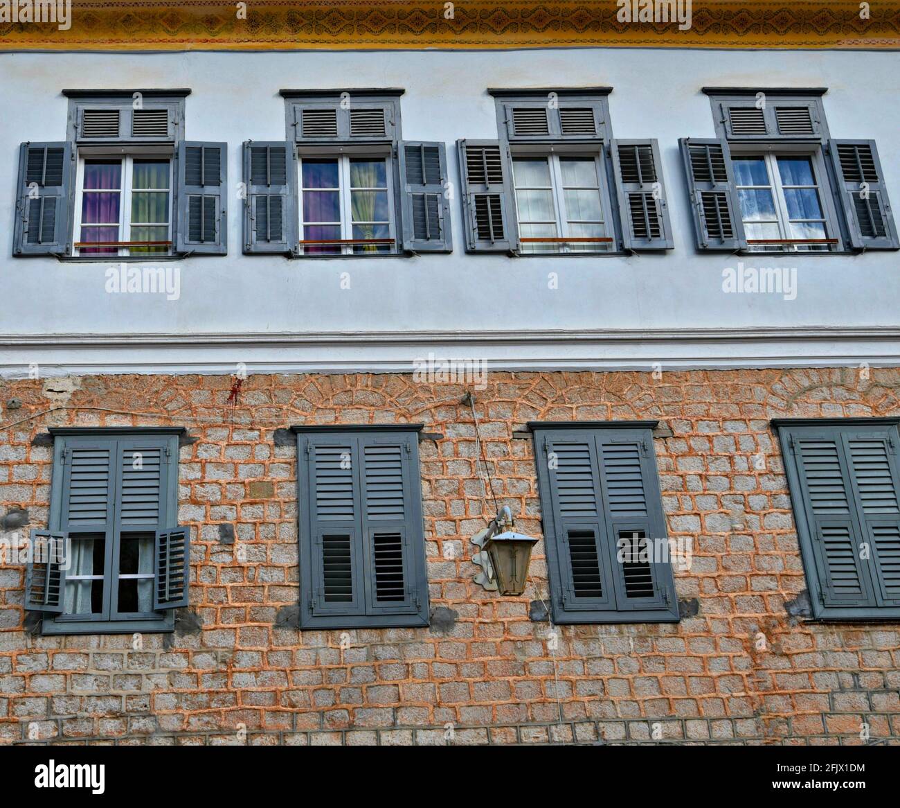 Neoclassical building facade with symmetrical windows on Syntagma ...
