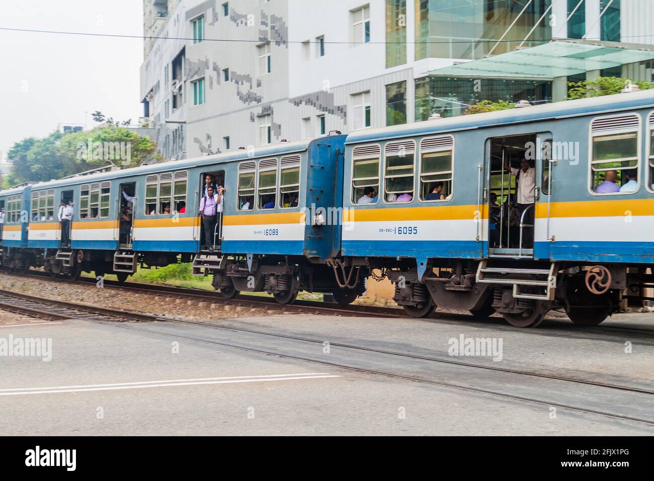 COLOMBO, SRI LANKA - JULY 26, 2016: Suburban train rides through ...